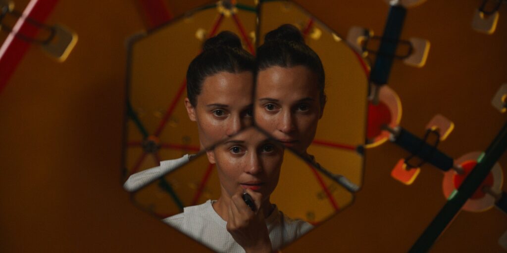 The Assessment Review — Alicia Vikander Outshines Elizabeth Olsen in Middling Sci-Fi Satire